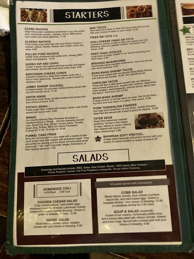 This menu isn't just a list of food—it's a roadmap to happiness with landmarks like "Ozark Nachos" and "Tater Kegs" beckoning hungry travelers.