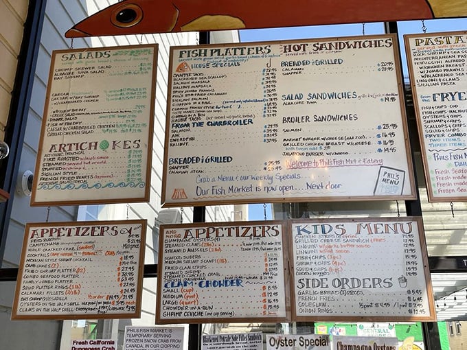 The menu board at Phil's is a seafood treasure map – overwhelming at first glance, but promising delicious discoveries with every handwritten offering.