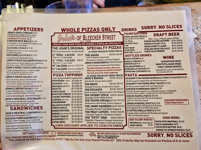 The menu reads like a love letter to Italian-American classics. Notice that "No Slices" warning? They're serious about it.