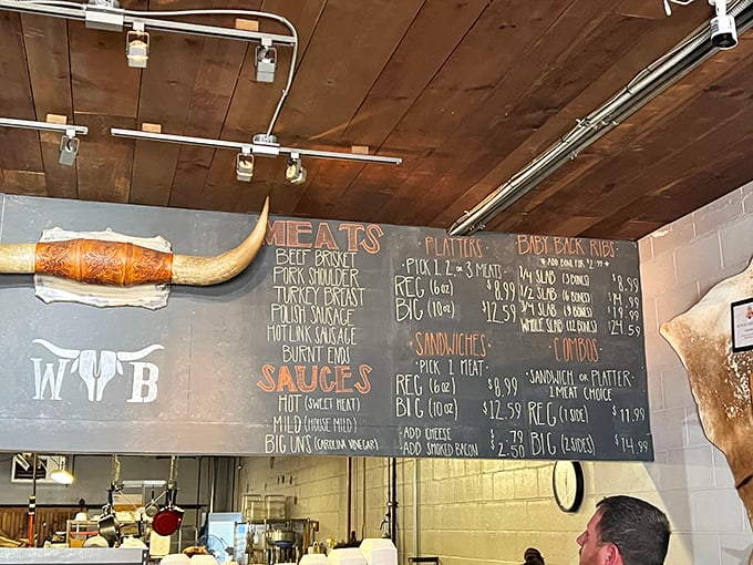 The menu board tells you everything you need to know—meat is the star here, with supporting roles from sides and sauces.