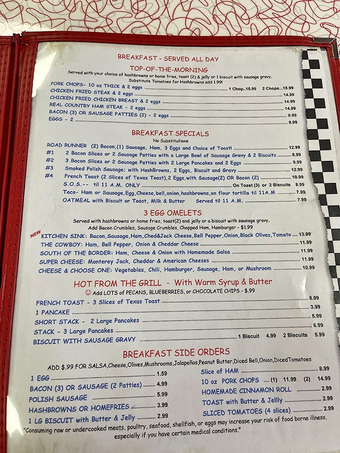 The menu reads like a love letter to breakfast classics—where "Kitchen Sink" isn't a metaphor but an actual omelet option.