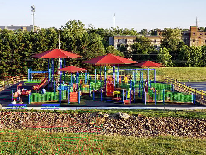 Childhood joy comes in primary colors at this vibrant playground. The perfect spot for little ones to burn energy while parents catch a breather.