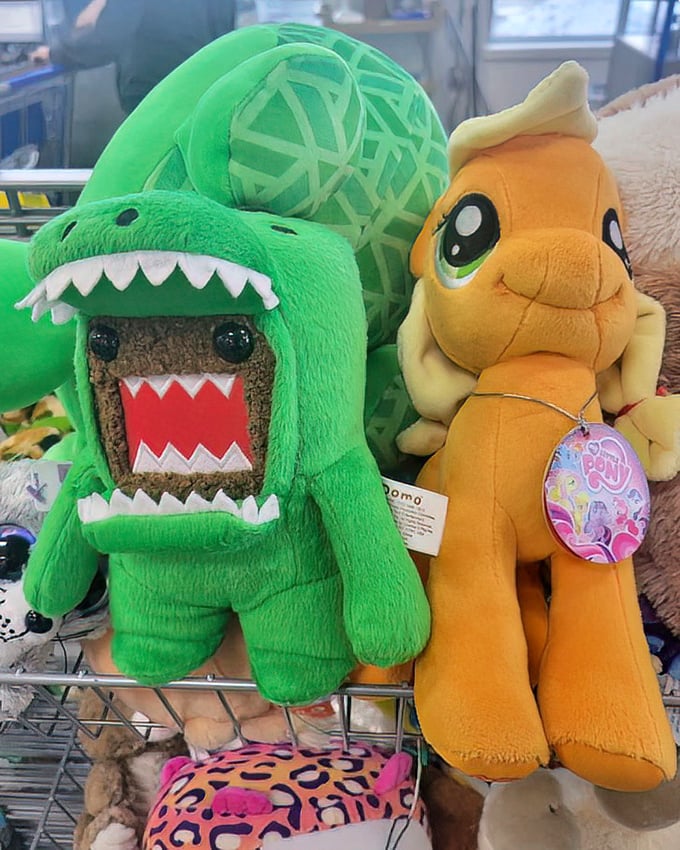 Domo in dinosaur drag meets My Little Pony – the toy section's odd couples tell stories of childhood joy waiting for second chances.