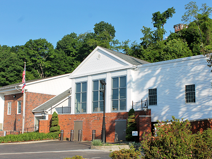 Pomeroy's Public Library combines brick and white siding in an architectural handshake between tradition and accessibility. Books with river views—what more could a reader want?