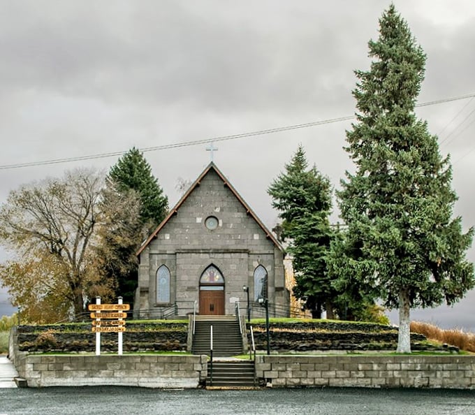 Sacred Heart Catholic Church perches on its stone foundation like a Gothic chess piece, offering spiritual solace and architectural eye candy in equal measure.