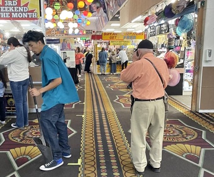 Where shoppers become treasure hunters navigating colorful pathways. That intricate carpet might be hiding a map to the best deals.