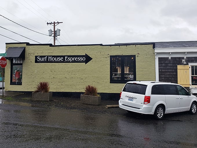 Surf House Espresso's cheerful yellow facade brightens even the grayest Washington morning—proof that good coffee and coastal charm can peacefully coexist.
