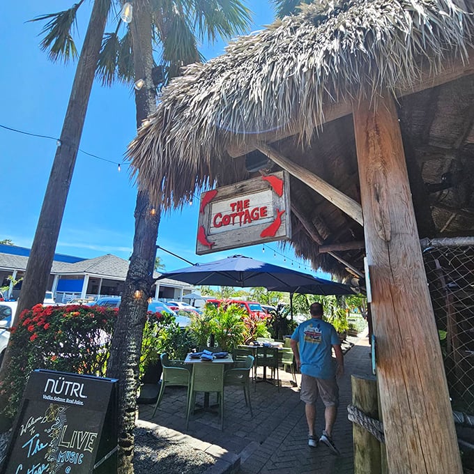 The Cottage beckons with its thatched roof and tropical ambiance—a place where island time is the only time that matters.
