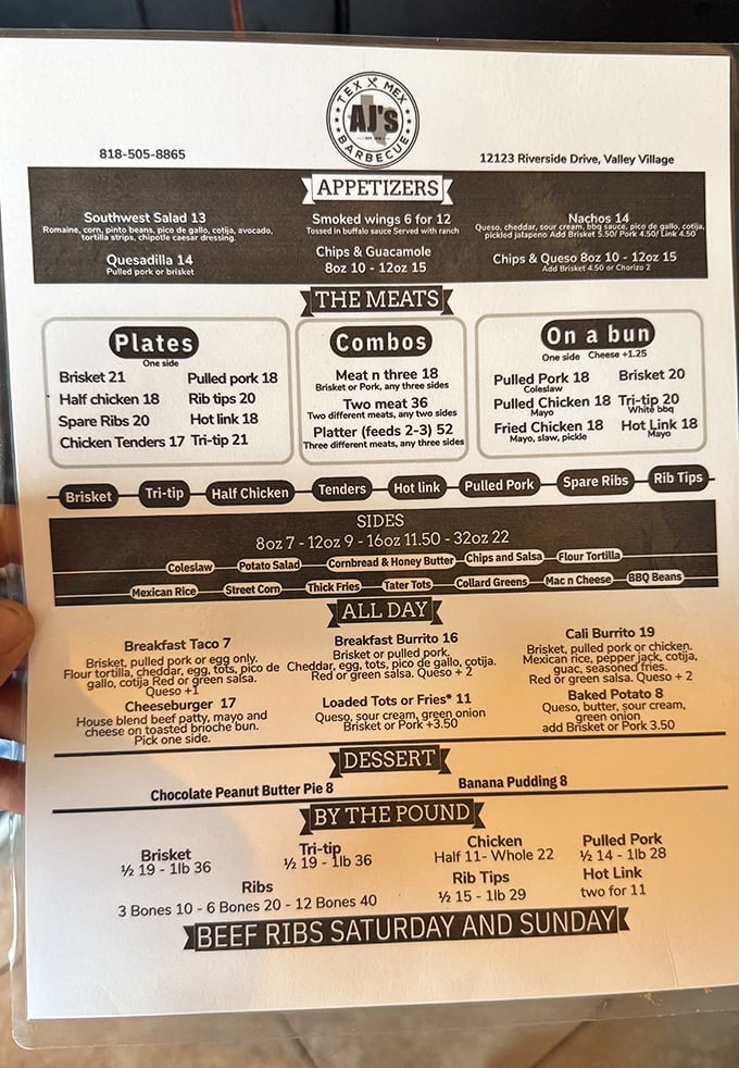 The menu board tells a delicious story—breakfast tacos to beef ribs, with a supporting cast of sides that deserve their own billing.