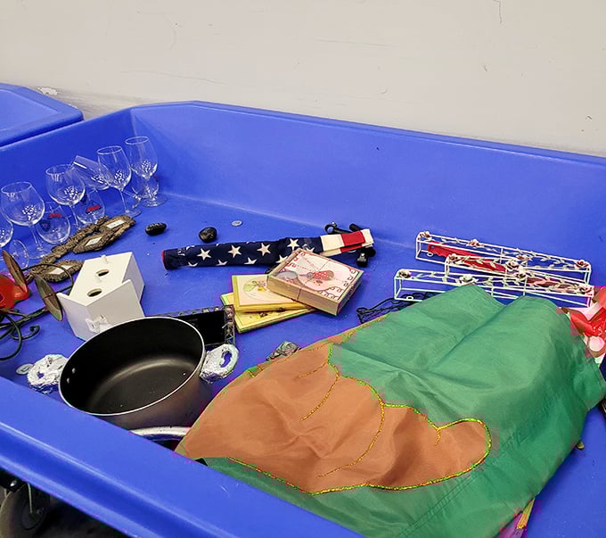 One person's castoffs become another's treasures. Crystal glasses, holiday decorations, and cookware waiting for their second act.