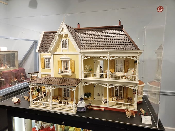 Victorian charm at 1 scale—complete with wraparound porches and gingerbread trim that would make any full-sized homeowner green with envy.