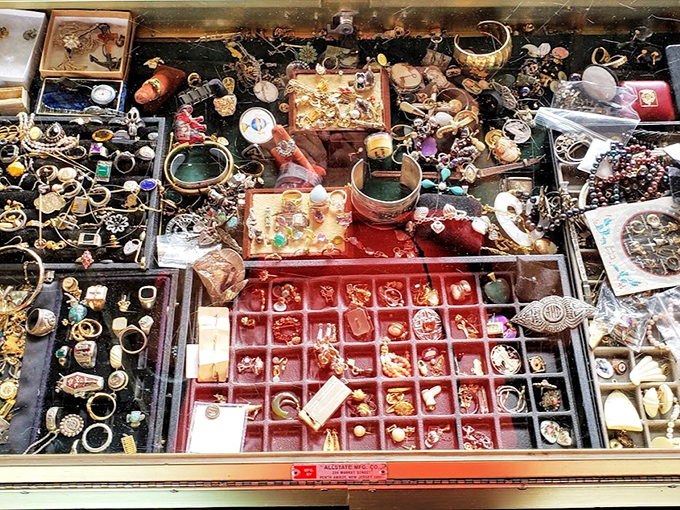 Each compartment in this jewelry display tells a story—some costume, some possibly genuine—all waiting for their next chapter.