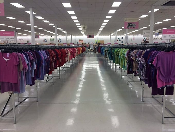 A rainbow road of possibilities. Each colorful shirt represents someone's past and someone else's future—fashion democracy at its finest.