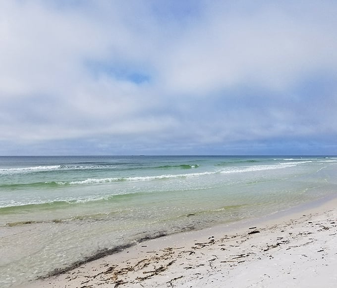 The gentle waves whisper secrets to the shore. No filter needed when Mother Nature already perfected the color palette.