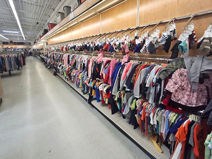 A rainbow of tiny garments awaits new adventures. Valley Thrift's children's section could outfit an entire preschool for pennies on the dollar.