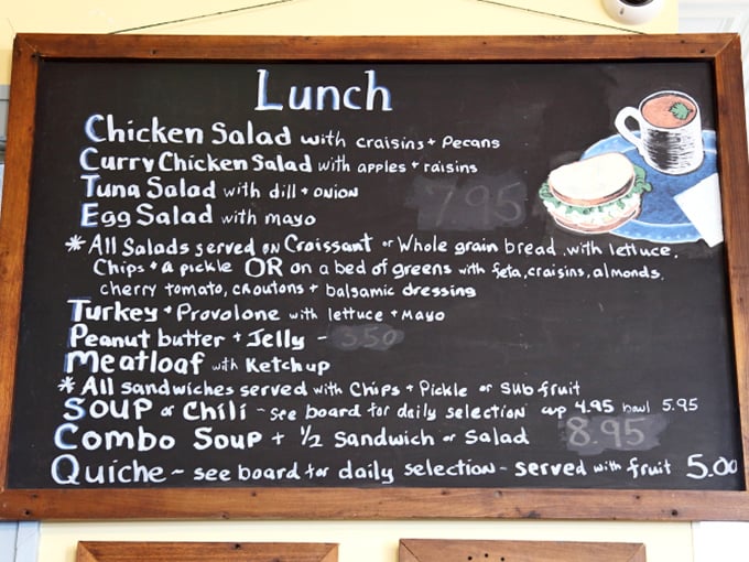The lunch menu reads like a love letter to comfort food—chicken salad with craisins, curry chicken with apples, and quiche that's worth setting an alarm for.