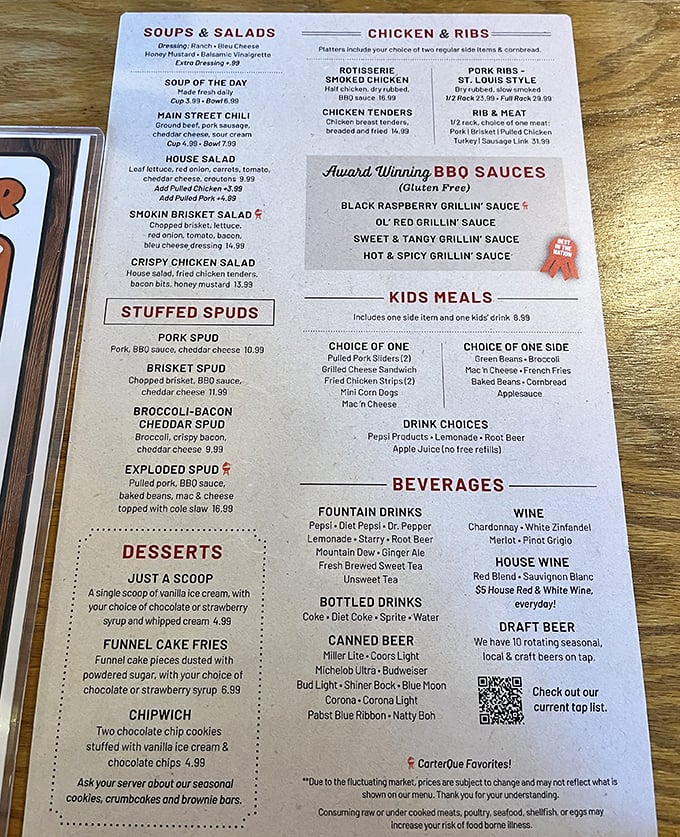 The menu—a sacred text of smoked delights. Notice how "Award Winning BBQ Sauces" gets special billing, like headliners at a meat concert.