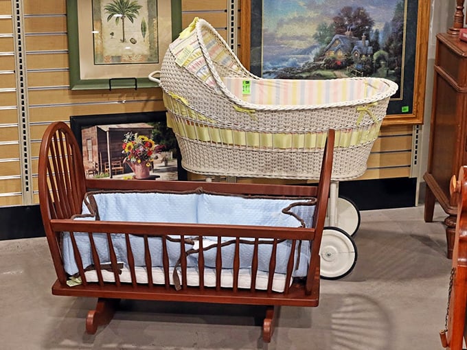 Yesterday's nursery items await tomorrow's families. That wooden cradle has probably rocked more babies than a 1970s compilation of lullabies.