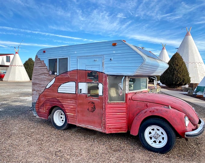 Part Beetle, part camper, all character—this red VW conversion looks ready for its starring role in a Wes Anderson road trip film.