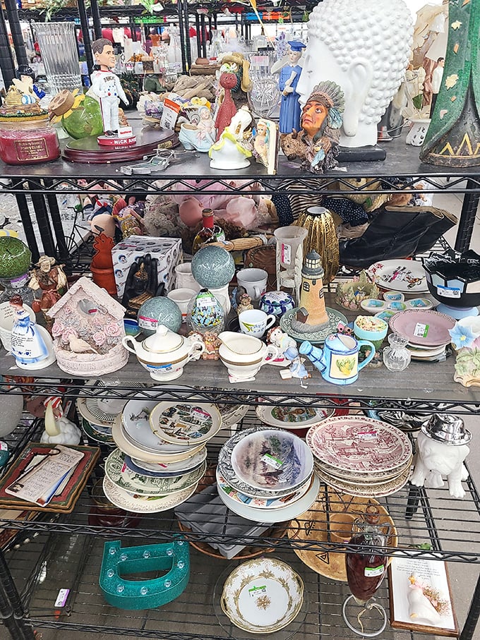 One person's discarded curiosities become another's conversation pieces—Buddha heads and vintage figurines waiting for their second act.
