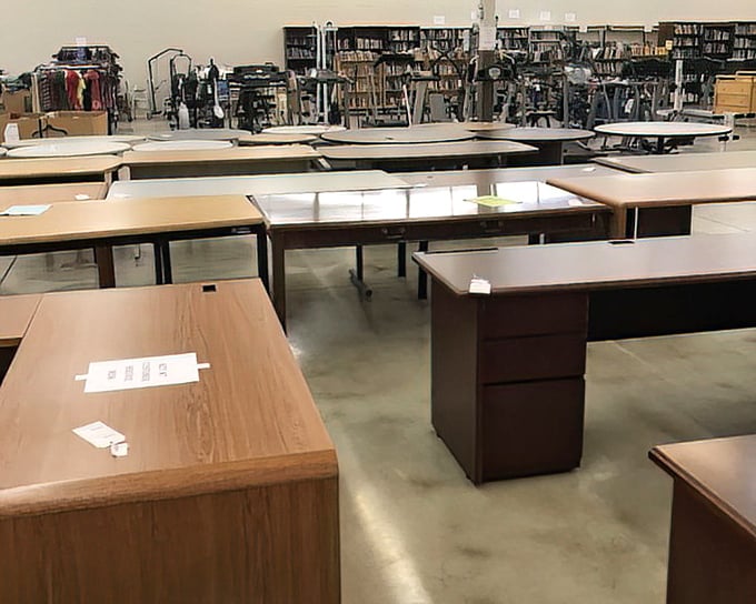 Office desks lined up like soldiers awaiting deployment to home offices across North Carolina. Your next brilliant idea could happen here!