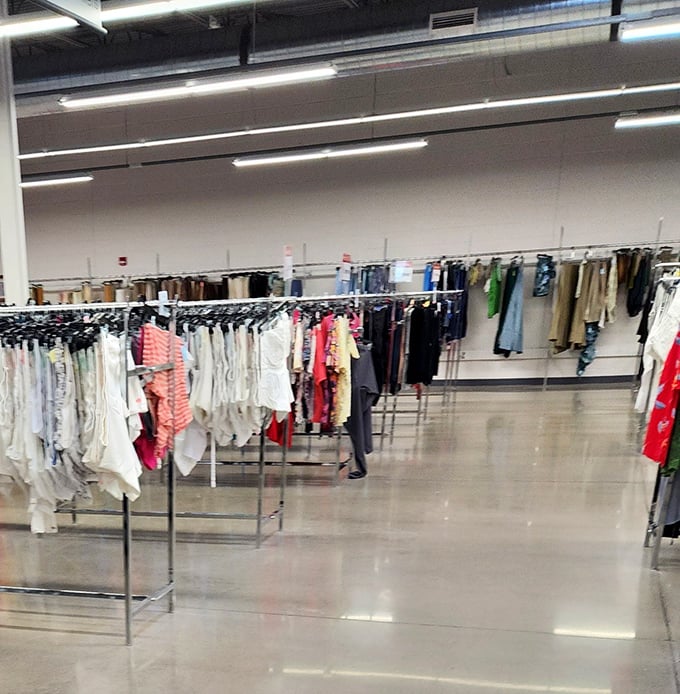 Organized chaos at its finest—racks of potential wardrobe transformations await the patient treasure hunter with a keen eye.
