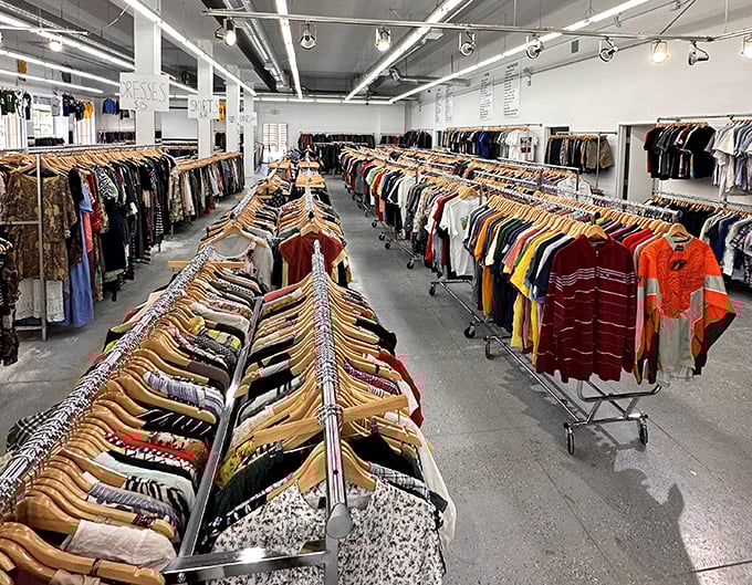 A sea of organized chaos where color-coded racks create a rainbow road to fashion nirvana. Somewhere in here is your next conversation starter.