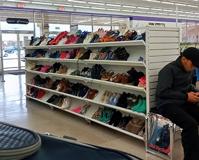 This footwear rainbow offers everything from practical flats to statement heels – someone's former fashion choices awaiting their second act.
