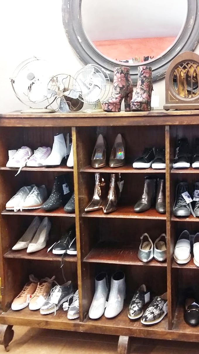 Not just shoes, but stories—each pair on these wooden shelves has walked a different path before finding its way to you.