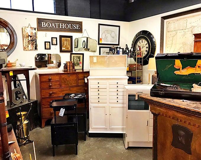 This isn't just a furniture display—it's a time capsule vignette where that "BOATHOUSE" sign has probably witnessed more lake memories than we'll ever know.