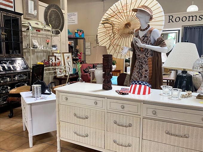 This isn't just furniture—it's a time capsule with drawers. The parasol adds that "I'm ready for my closeup in a Tennessee Williams adaptation" flair.