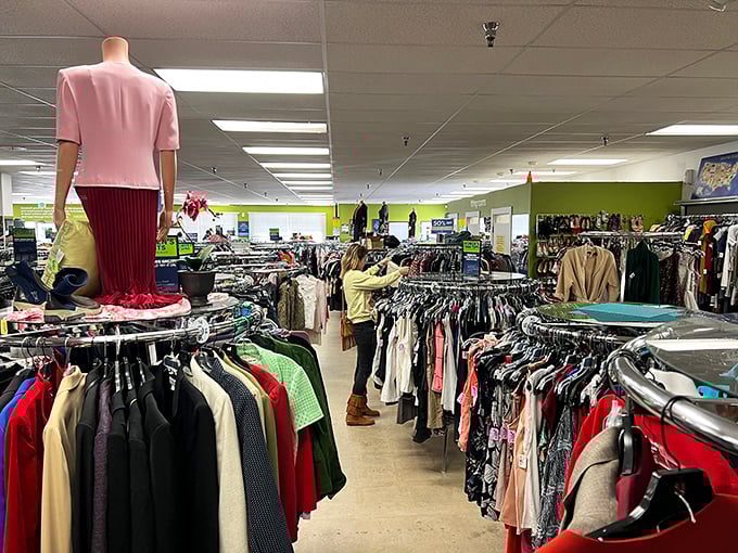 A sea of possibilities hanging on racks as far as the eye can see—each item with its own story waiting to be continued.