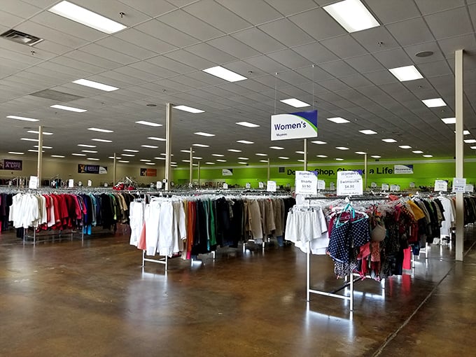 Inside, a sea of clothing racks stretches toward the horizon—each hanger potentially holding your next favorite outfit.
