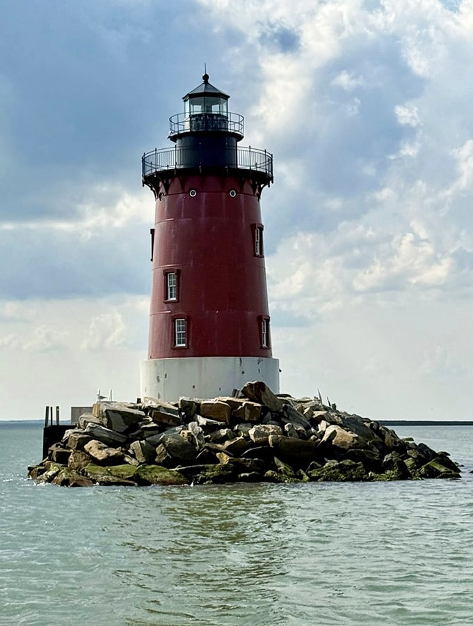 Up close, the lighthouse reveals its true character—sturdy, steadfast, and slightly weathered, like your favorite uncle who still tells the best sea stories.