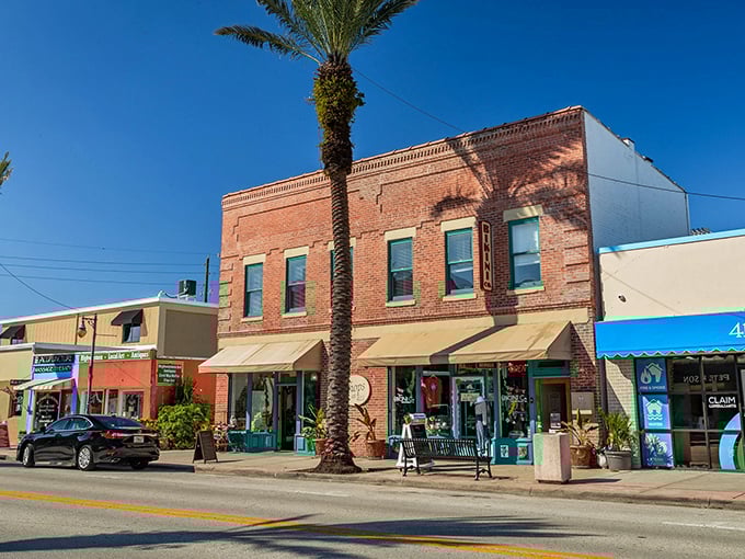 Historic brick buildings house boutiques where shopkeepers know regulars by name—the kind of Main Street that big-box retailers tried to make extinct.
