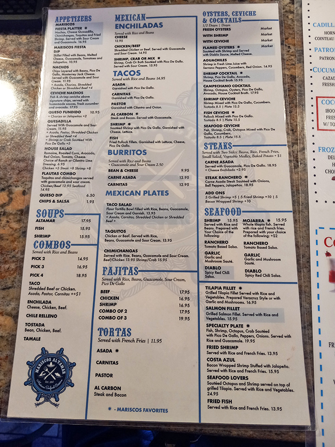 The menu reads like a love letter to Mexican coastal cuisine—a treasure map where X marks the spot for everything from ceviche to whole fried fish.