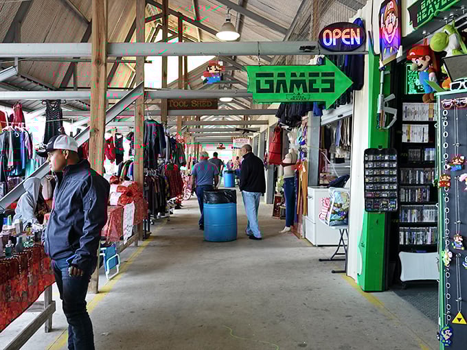 Where vintage video games meet everyday essentials. The green "GAMES" arrow points the way to childhood nostalgia, while grown-up necessities wait just steps away.