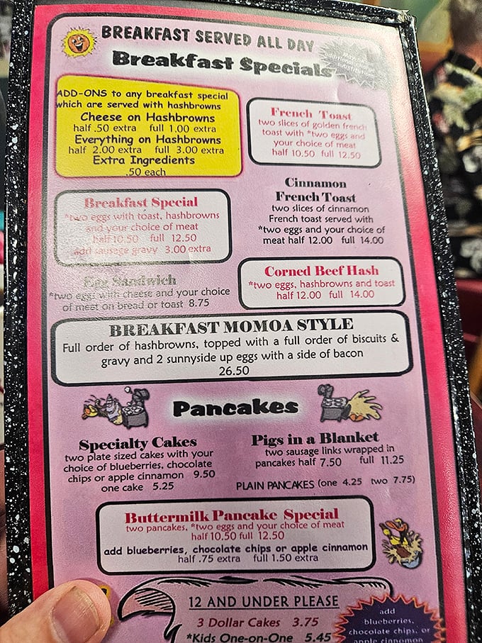Breakfast decisions, breakfast decisions! The well-worn menu reveals treasures like the legendary "BREAKFAST MOMOA STYLE"—as impressive and satisfying as its namesake.