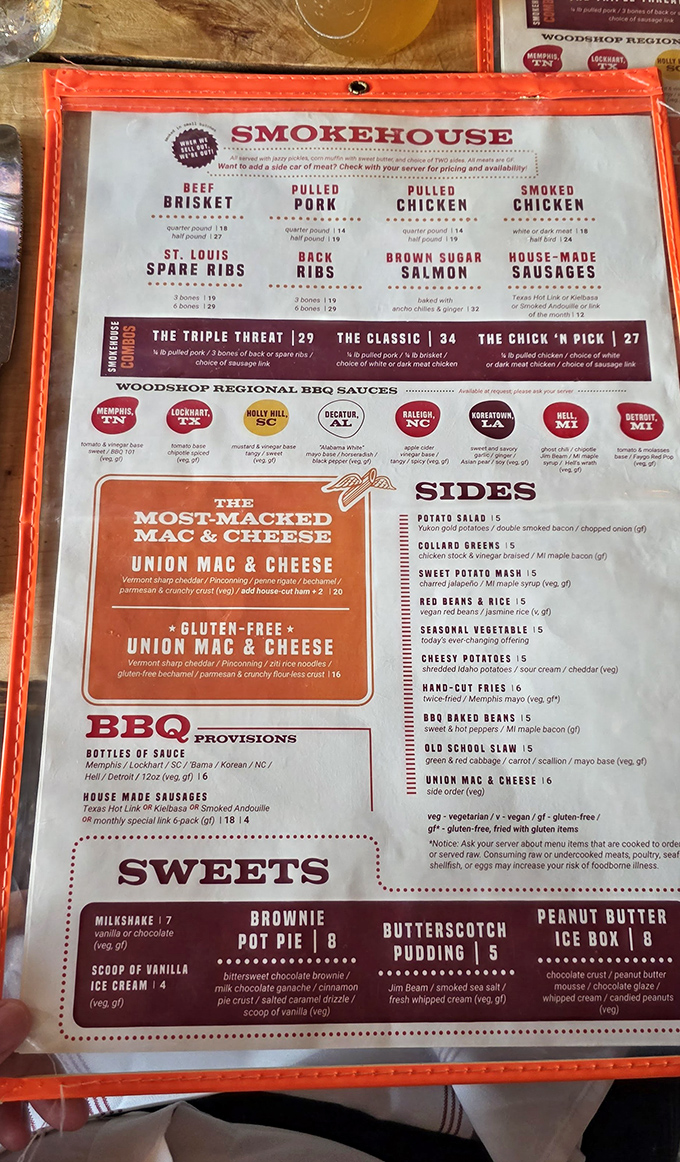 The menu reads like barbecue poetry—St. Louis ribs, pulled pork, and that legendary mac & cheese competing for your affection. Choose wisely, or just order it all.