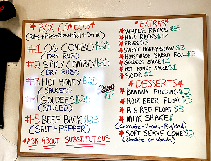 Hand-written menus mean someone's too busy smoking perfect ribs to worry about fancy printing, which is exactly right.