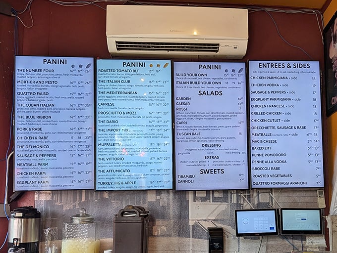 The menu board reads like a love letter to carbs and cheese – resistance is futile, my friends.