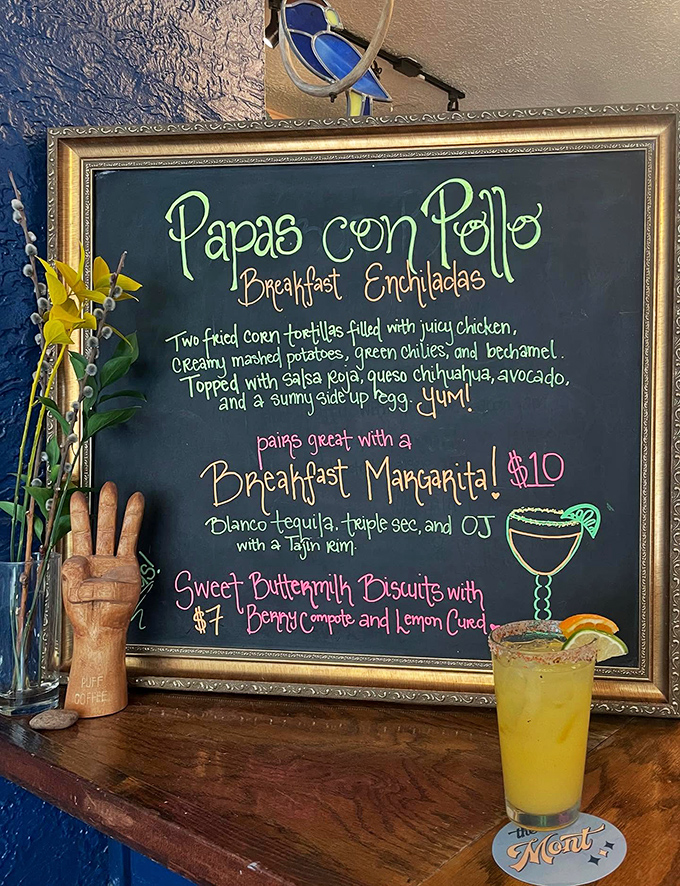 That chalkboard menu isn't just listing food—it's publishing poetry. The "Papas con Pollo" breakfast enchiladas are practically Shakespearean.