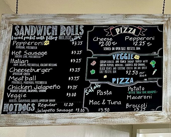 The chalkboard menu reads like poetry to pretzel enthusiasts—sandwich rolls, pizzas, and hot dogs all getting the royal pretzel treatment.