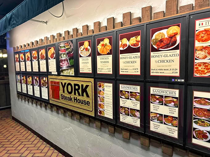 The legendary menu board—a backlit gallery of culinary promises where photos do the talking and your stomach does the listening.