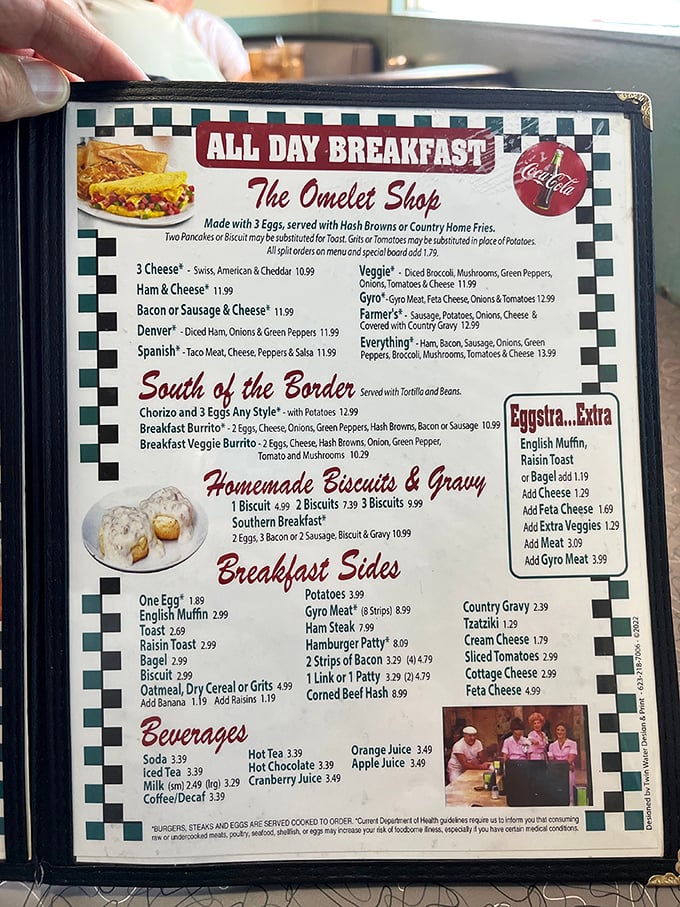 This menu isn't just laminated paper—it's a roadmap to happiness. The "Everything" omelet lives up to its ambitious name.