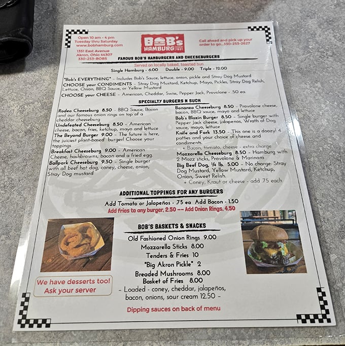 The menu reads like a love letter to simplicity—no foams, no reductions, just honest burgers that have kept Akron coming back for generations.