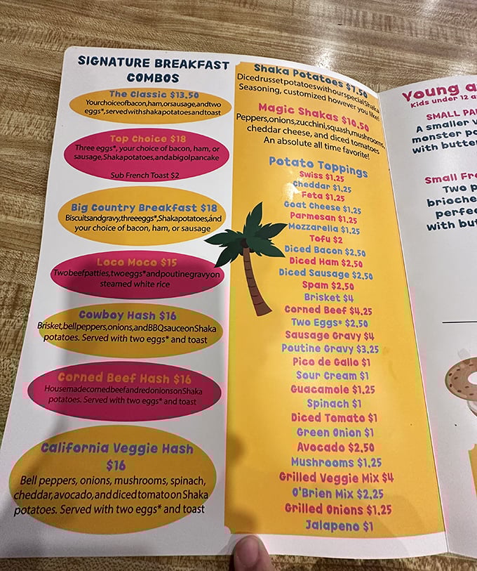 The colorful menu reads like a breakfast lover's dream journal, with signature combos and those famous Shaka potatoes stealing the spotlight.
