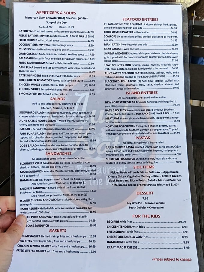 The menu reads like a love letter to the Atlantic – from Menorcan clam chowder to blackened fish tacos, every Florida favorite makes an appearance.