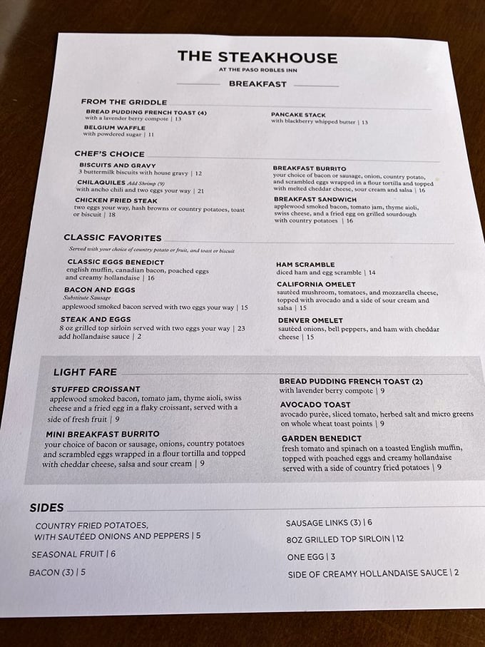 The breakfast menu reveals The Steakhouse's morning personality – bread pudding French toast with lavender berry compote might just change your life.