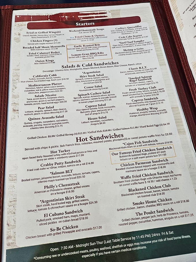The menu reads like a love letter to American comfort food – each laminated page promising the kind of satisfaction that modern fusion restaurants can only dream about.